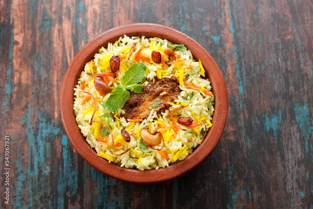 Chicken biryani Spicy Indian Malabar biryani Hyderabadi biryani, Dum ...