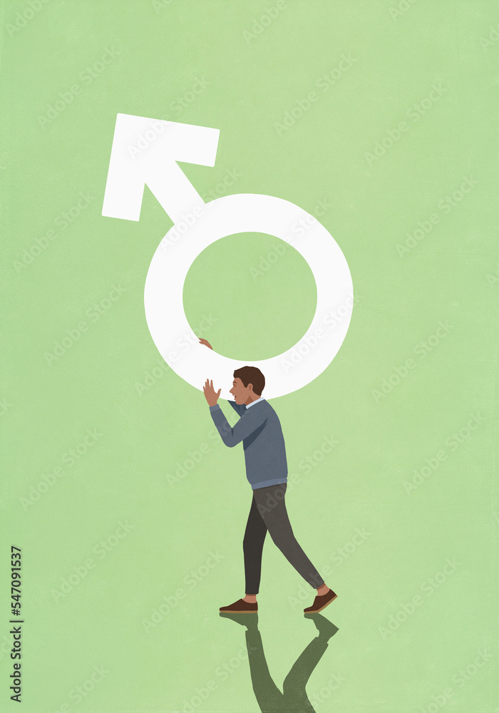 Man carrying male gender symbol against green background Stock ...