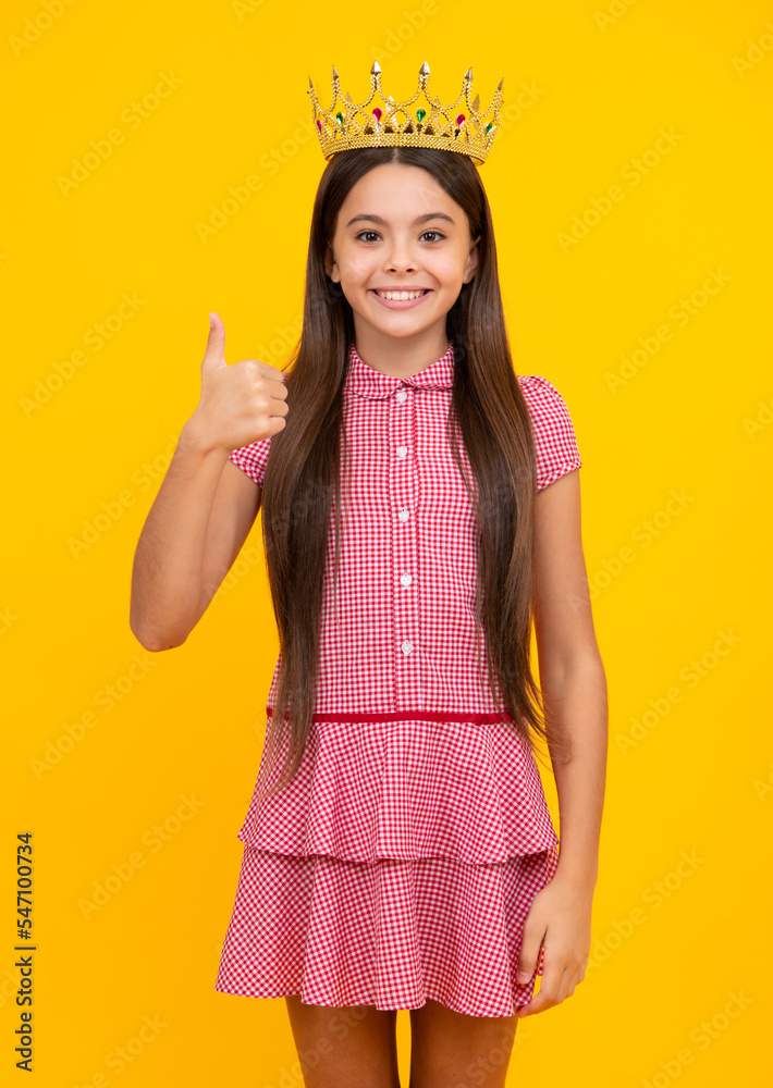 Girls birthday party, funny kid in crown. Imagine herself a queen ...