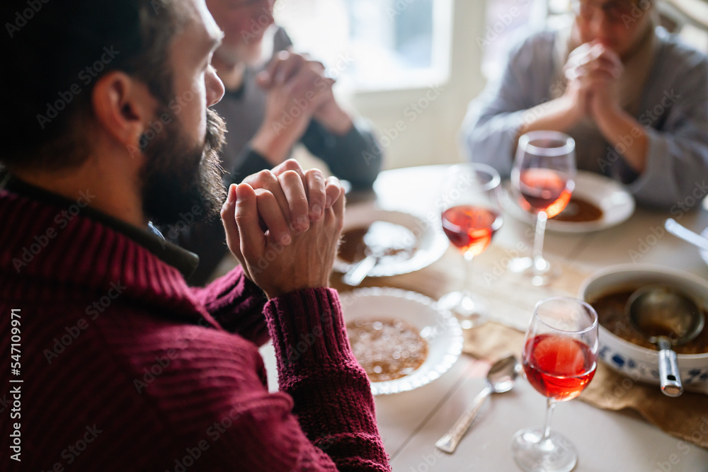 Family and religious concept. Group of multiethnic people with food ...