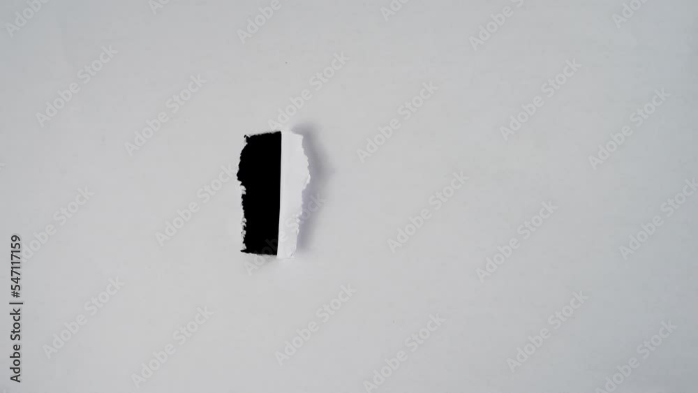 Horizontal torn paper stop motion for copy space. Ripped paper ...