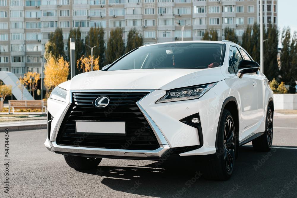 Front view of car is white Lexus RX 300, premium mid-size crossover SUV ...