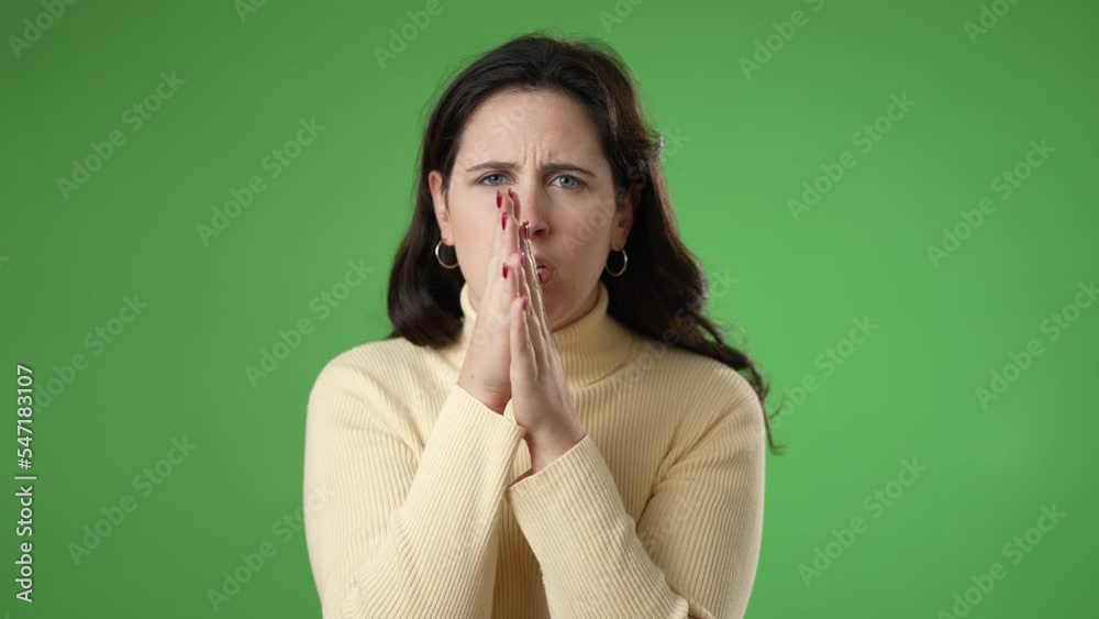 Young worried pleading woman 20s hold hands folded in prayer begging ...