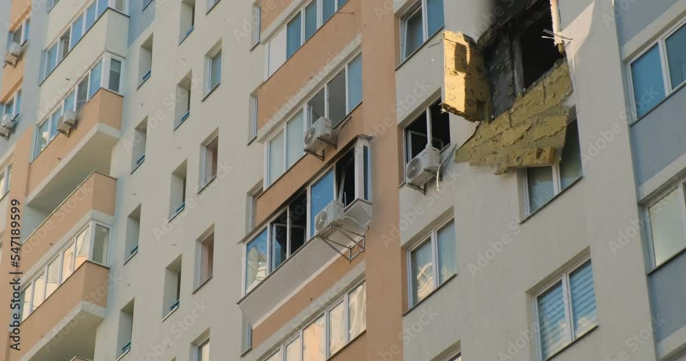 Consequences of a fire, the outer side of an apartment building. Burnt ...