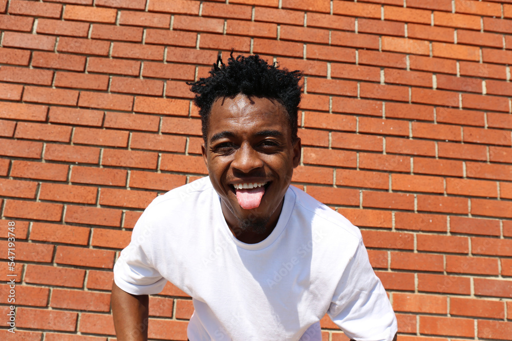 African American man with dread fade haircut making funny faces ...