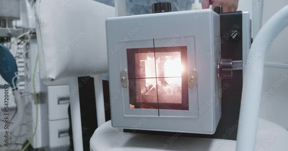 Light x-ray machine lies on a chair. You can see how the X-ray ...