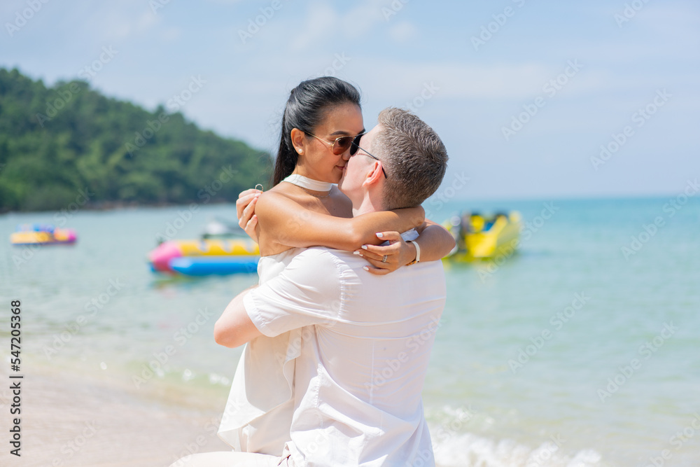 Romatic couple passionately kissing on dock. Beautifull wedding couple ...