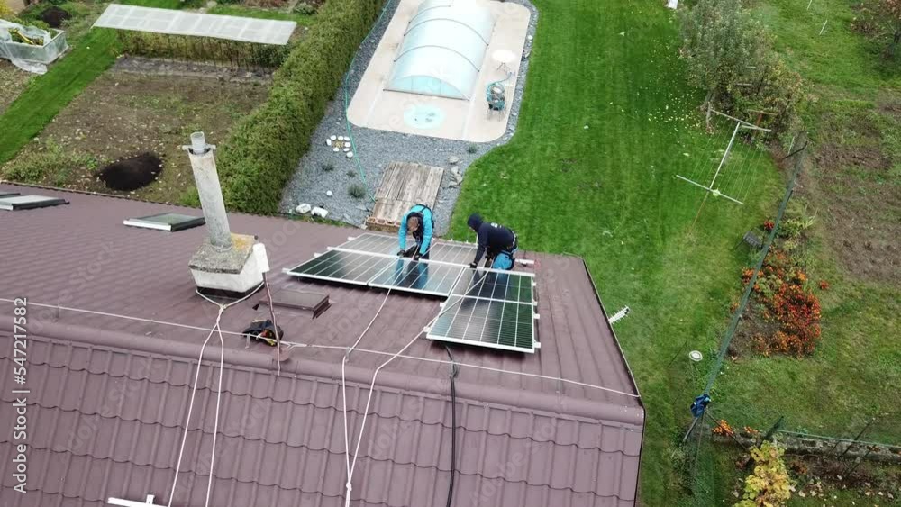 Installation of photovoltaic panels. Aerial view of the construction of ...