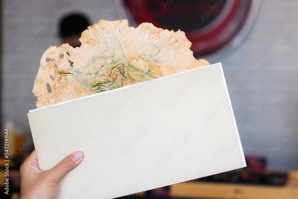 Sembei is a Japanese rice cracker made with seaweed Salad, heated to ...
