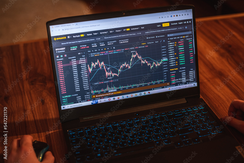 Bitcoin chart on Binance crypto exchange on Lenovo laptop's display on ...