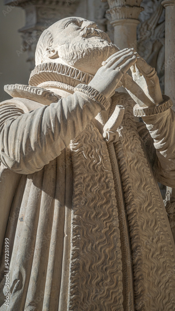 Ancient statue of a praying rich nobleman from middle age aristocracy ...