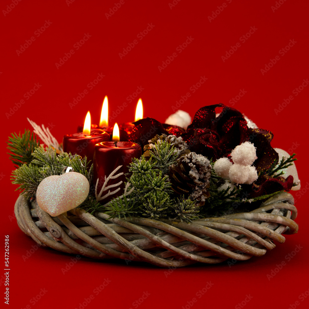 Lighting candles on the Advent Wreath on the first Sunday in December ...