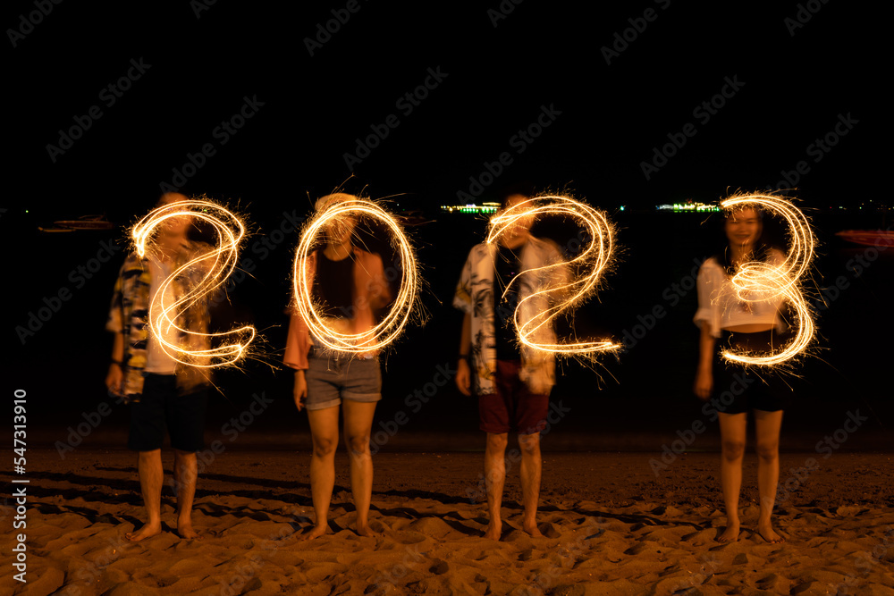 Happy New Year 2023.young friends having fun at New Year's Eve Party ...