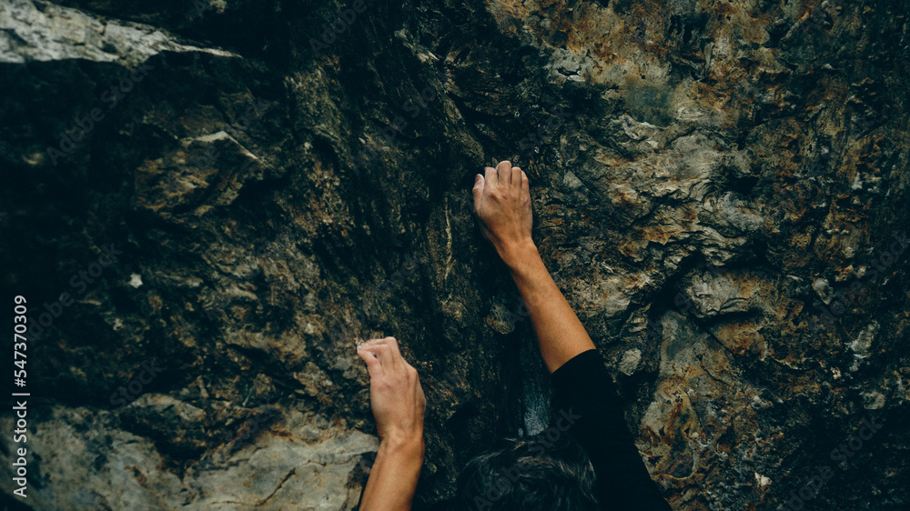 climber's hand while bouldering Stock Photo | Adobe Stock