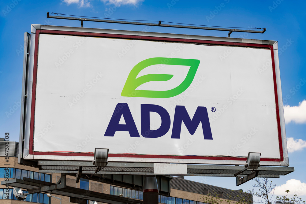 Advertisement billboard displaying logo of ADM Stock Photo | Adobe Stock