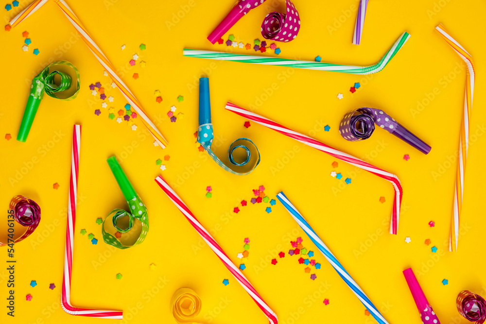 Abstract colored party background. Multi-colored party horns ...