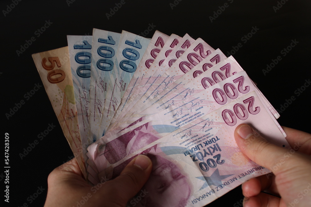 Hand of man counting Turkish money. Turkish lira banknotes. Paper ...