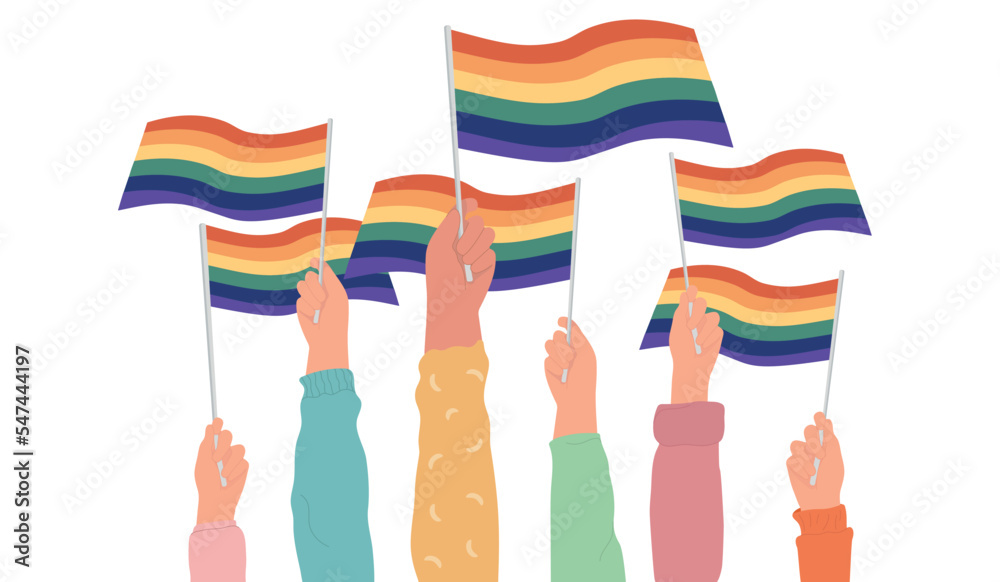 Human hands holding rainbow transgender and lgbt flags during pride ...