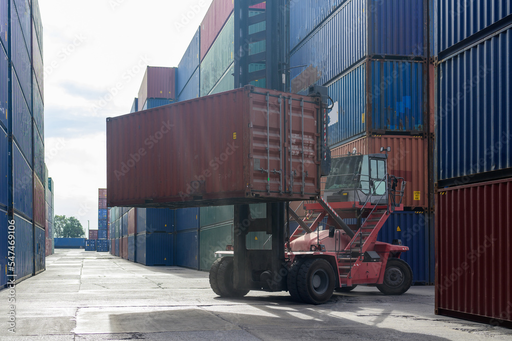 Industrial forklift truck loading container box at yard, Crane lifting ...