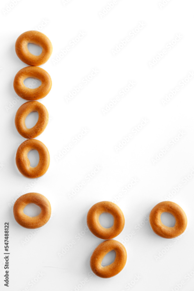 Symbol coma bagel. Bagels font. Alphabet from set of small dry bagels ...