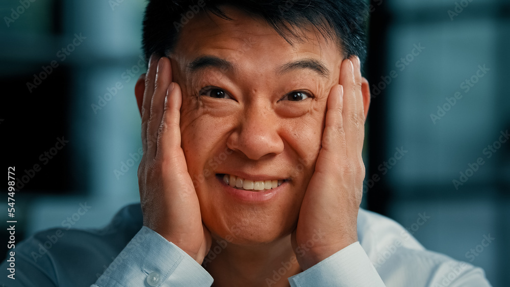 Positive emotional asian korean man businessman 40s male employee hold ...