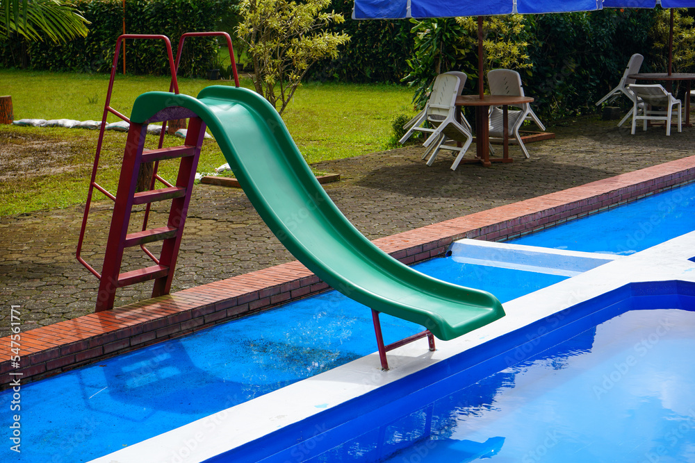 Pool slide on the side of the pool which is not high. Suitable for ...