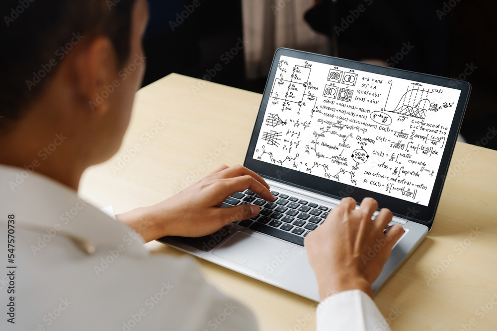 Mathematic equations and modish formula on computer screen showing ...
