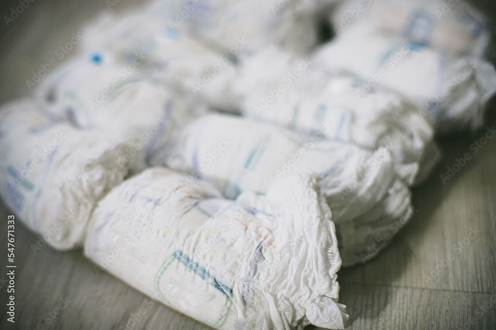 bunch of diapers. Contaminated with excrement and rolled used diapers ...