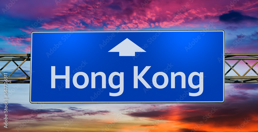 Road sign indicating direction to the city of Hong Kong Stock Photo ...