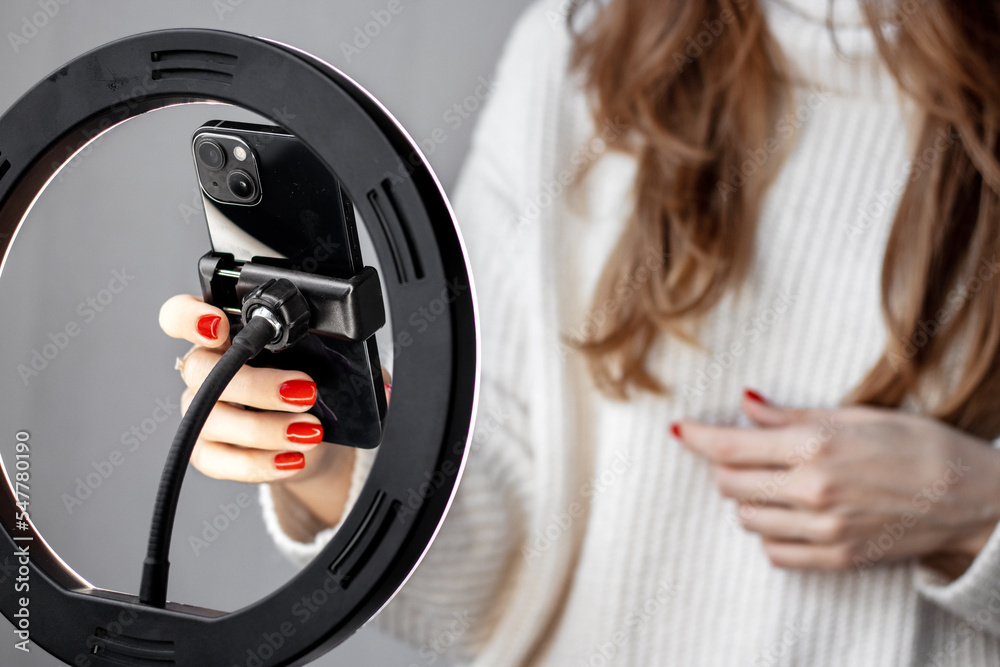 woman girl young blogger vlogger talking with followers hand holding ...