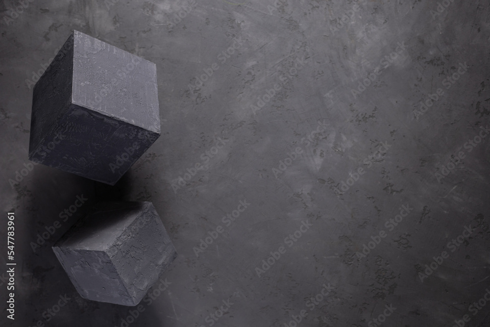 Cement block on floor background as construction concept. Concrete cube ...