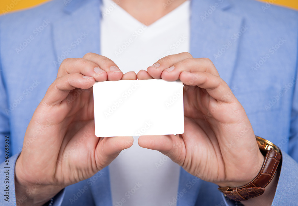 closeup of business card. hold business card in hand. holding business ...