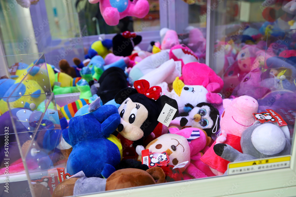 Electronic claw machine to grab stuffed animals. Claw machine. Arcade ...