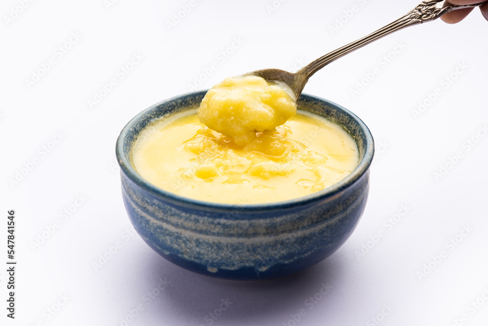 Pure Tup OR Desi Ghee also known as clarified liquid butter Stock Photo ...
