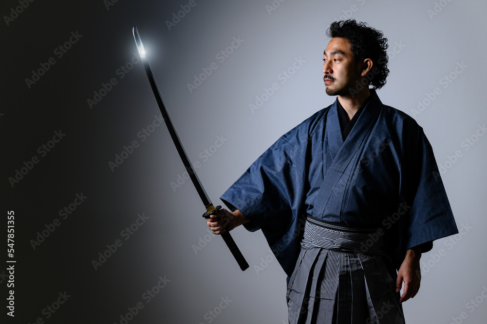 Image of a cool Japanese 「samurai 」with a sword Stock Photo | Adobe Stock