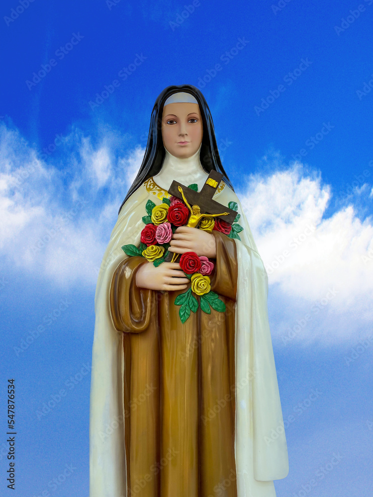 Beautiful statue of St Theresa,Saint Therese of Child Jesus outside the ...