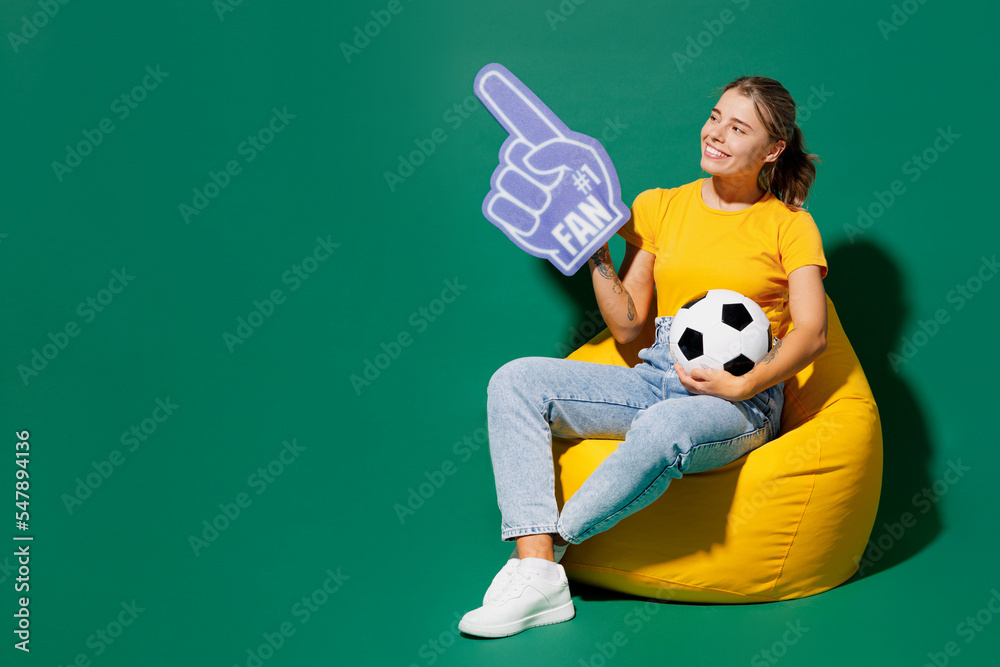 Full body young woman fan wear yellow t-shirt point aside foam 1 fan ...