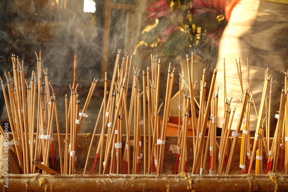 Hand lace incense on joss stick pot to make a wish,Incense that was lit ...