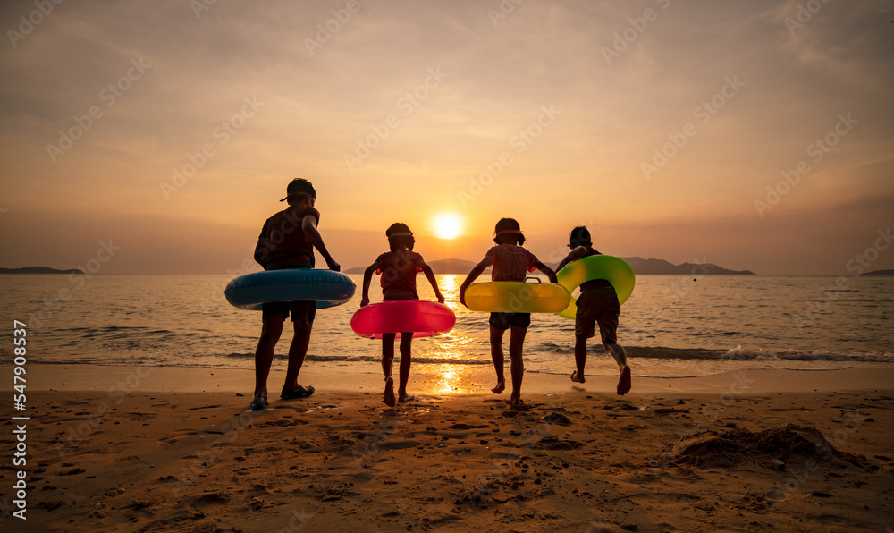 Silhouette happy child having fun on summer vacation Kid playing ...