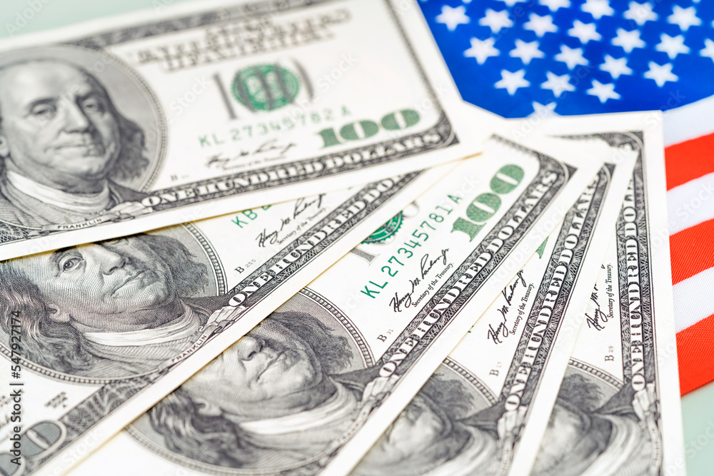 100 us dollars on top view american flag background Stock Photo | Adobe ...