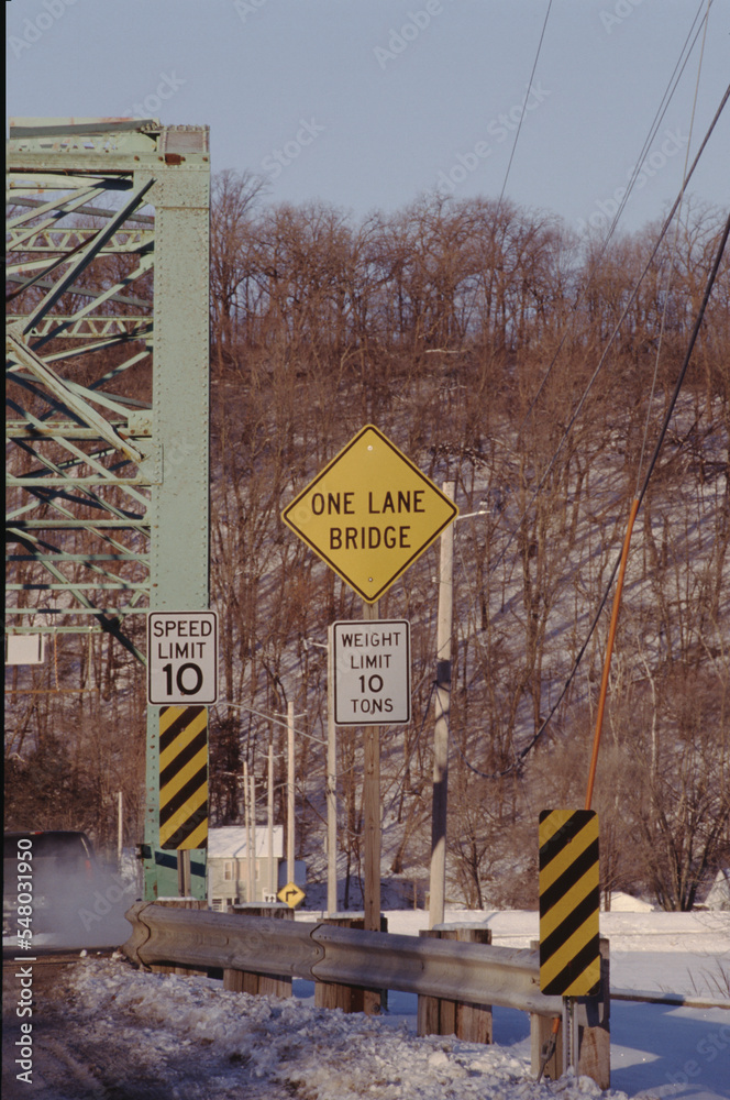 One lane bridge, speed limit, and weight limit signs on Tavener's ...