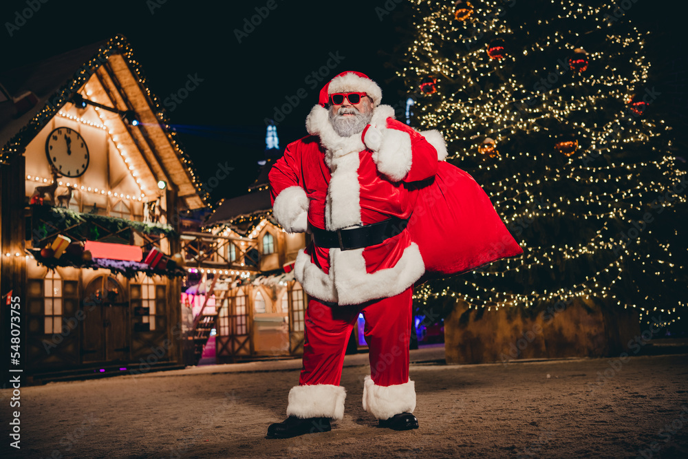 Full length photo of big santa saint nicholas hold carry presents ...