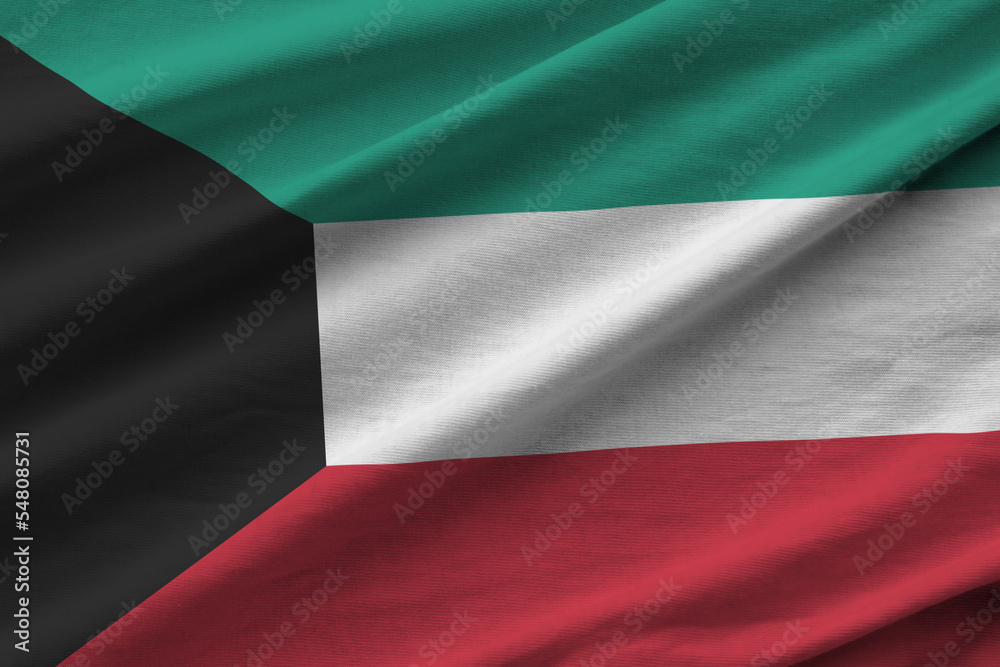 Kuwait flag with big folds waving close up under the studio light ...