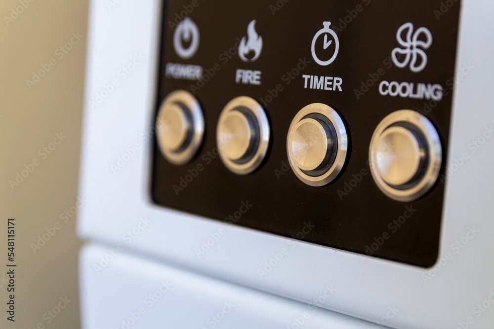 The round push button switch of the coffee roaster with the symbol ...