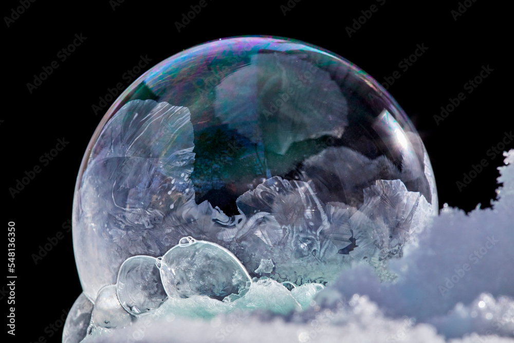 Ice bubble in winter during subzero weather forming swirling ice ...