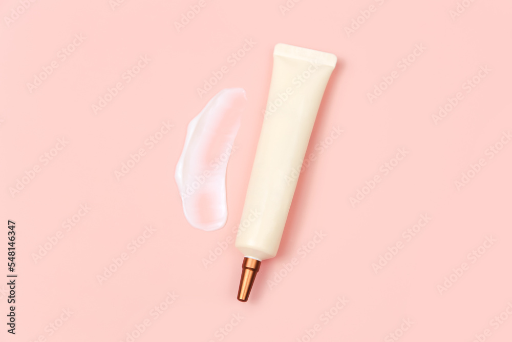 Mockup of face and eye cream squeeze cosmetic tube with long nozzle and ...