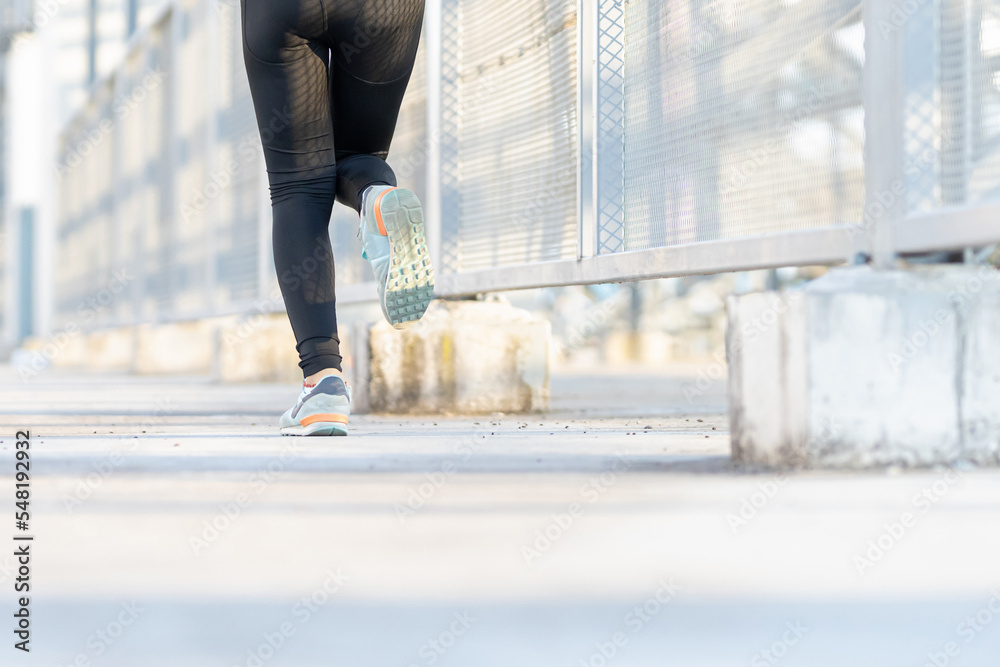 Sporty Asia female runner image of attractive woman in modern ...