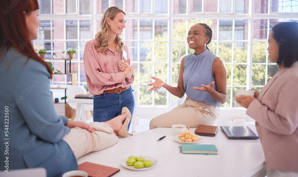Diversity, lunch and business women relax in an office building talking ...