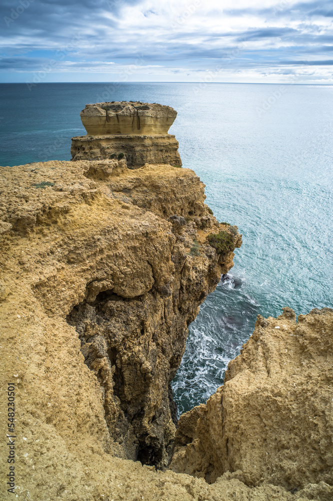 rocks and cliffs on the beach, ocean shore. beach beach and rocks ...