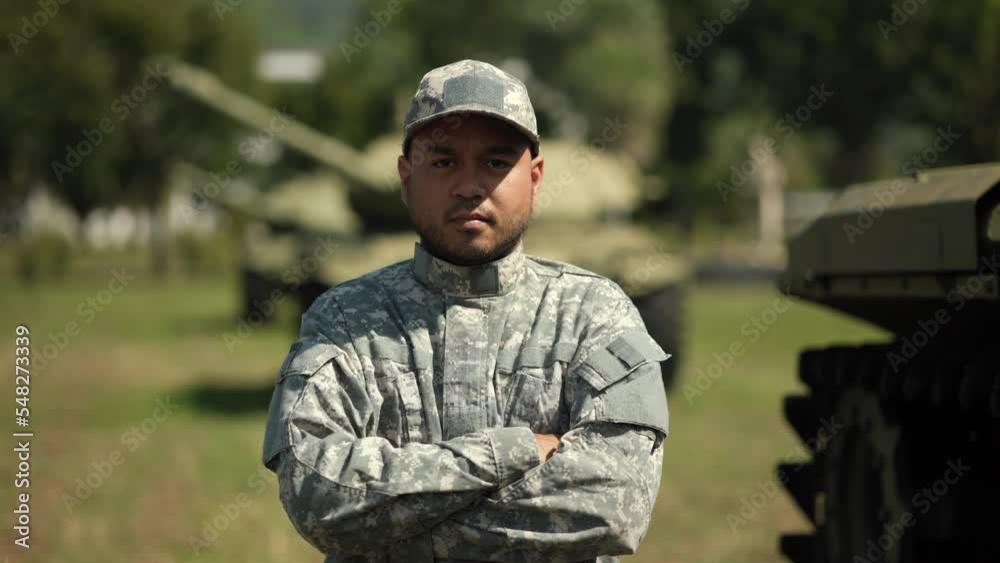Serious man in military uniform special forces soldier standing against ...